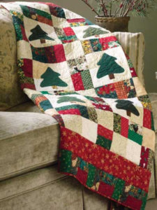 Nine Patch Christmas Quilt For Everyone With Holiday Fabric Scraps ...