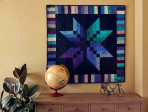 A Jelly Roll Star Quilt Using Just One Binding Tool - Quilting Cubby